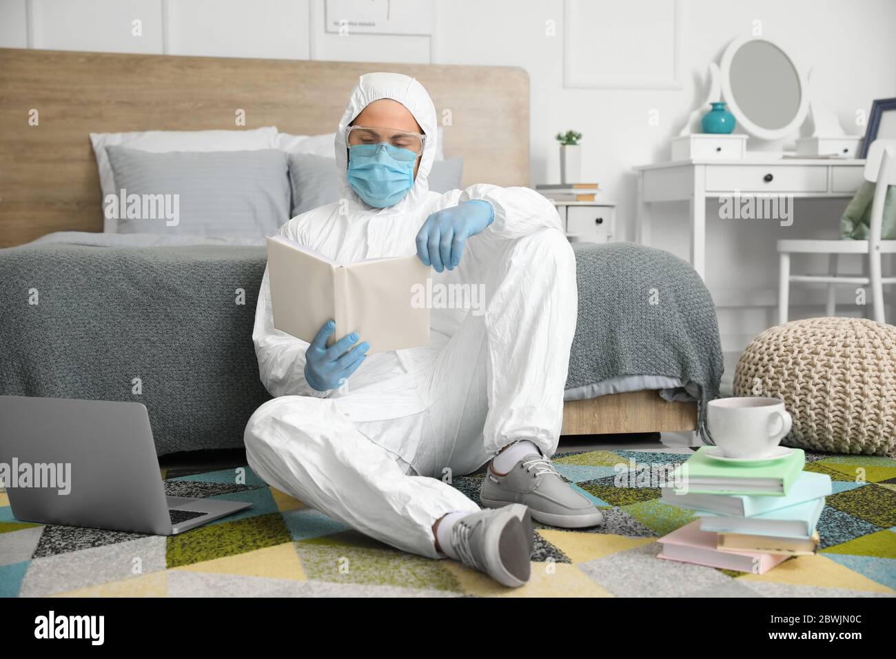 Hazmat suit home hi-res stock photography and images - Alamy