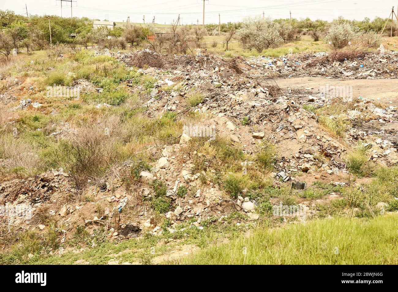View of landfill outdoors. Concept of soil pollution Stock Photo - Alamy