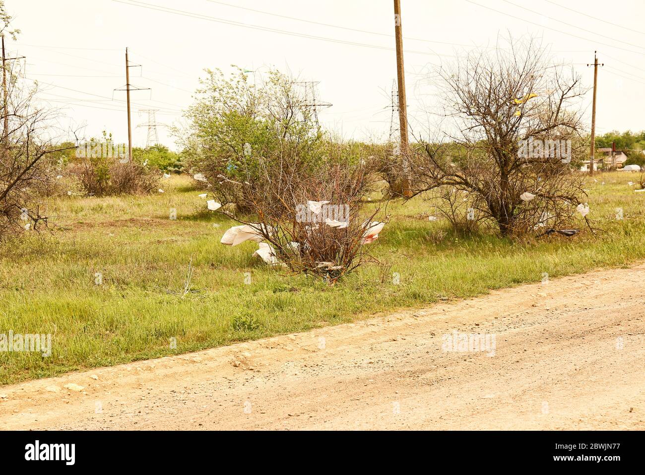 Countryside near landfill. Concept of soil pollution Stock Photo - Alamy