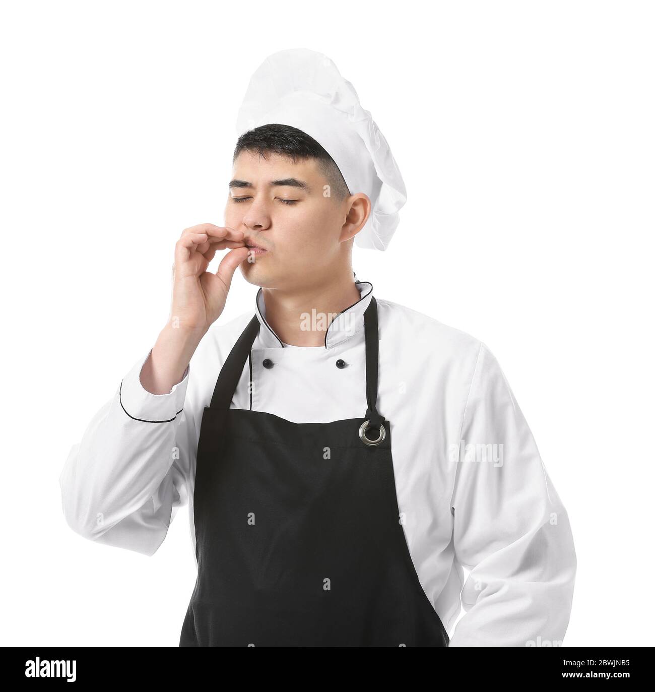 Handsome Asian chef on white background Stock Photo - Alamy