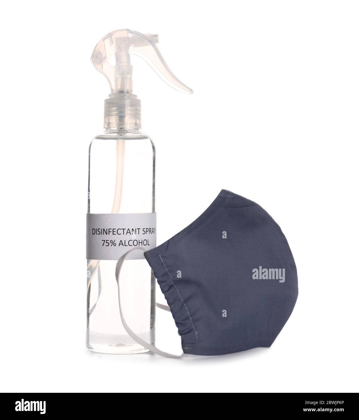 Bottle of disinfectant and medical mask on white background Stock Photo ...