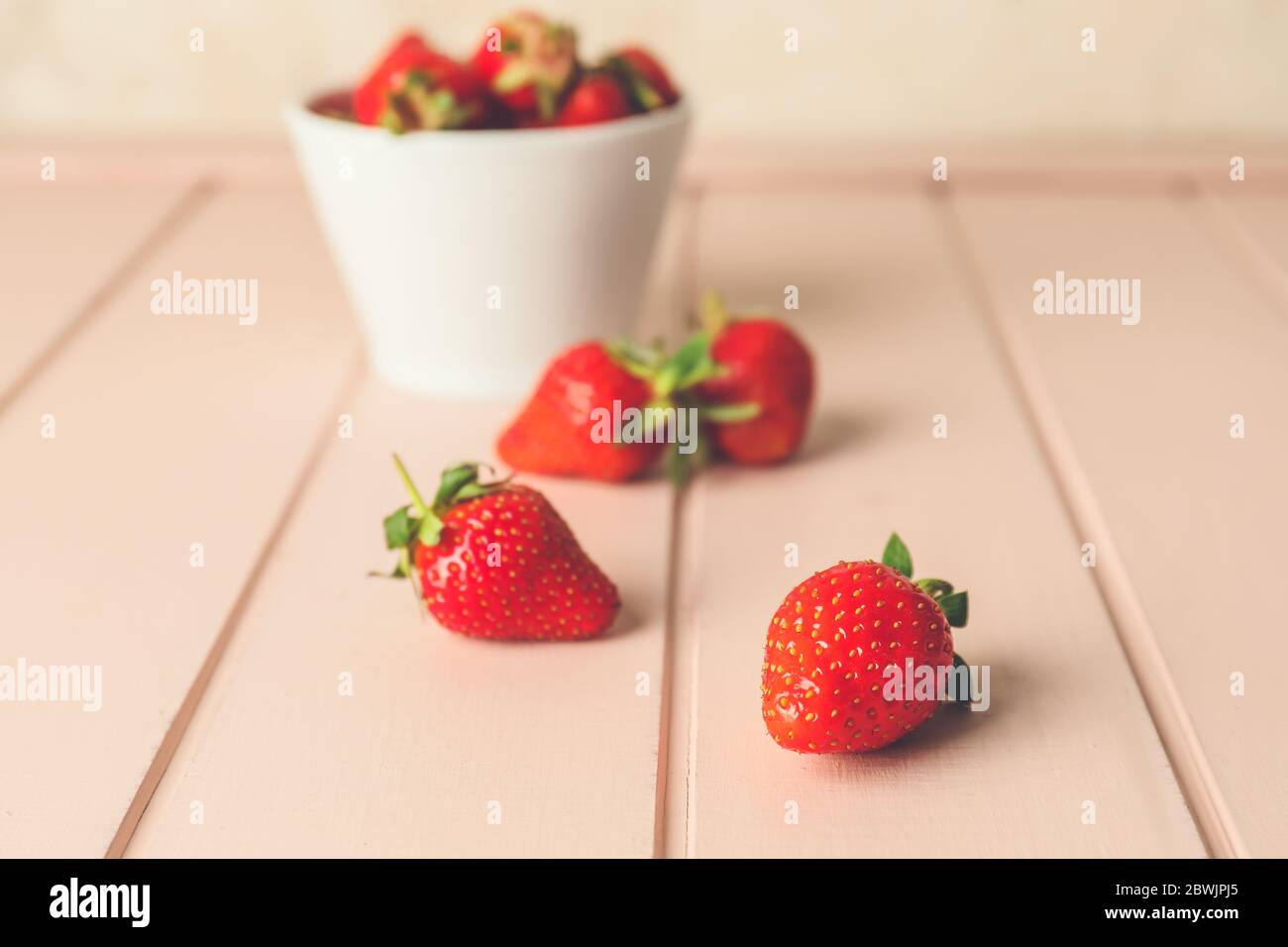 Sweet ripe strawberry on table Stock Photo - Alamy