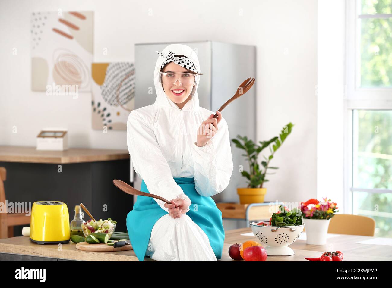 Woman kitchen cooking crazy hi-res stock photography and images - Alamy
