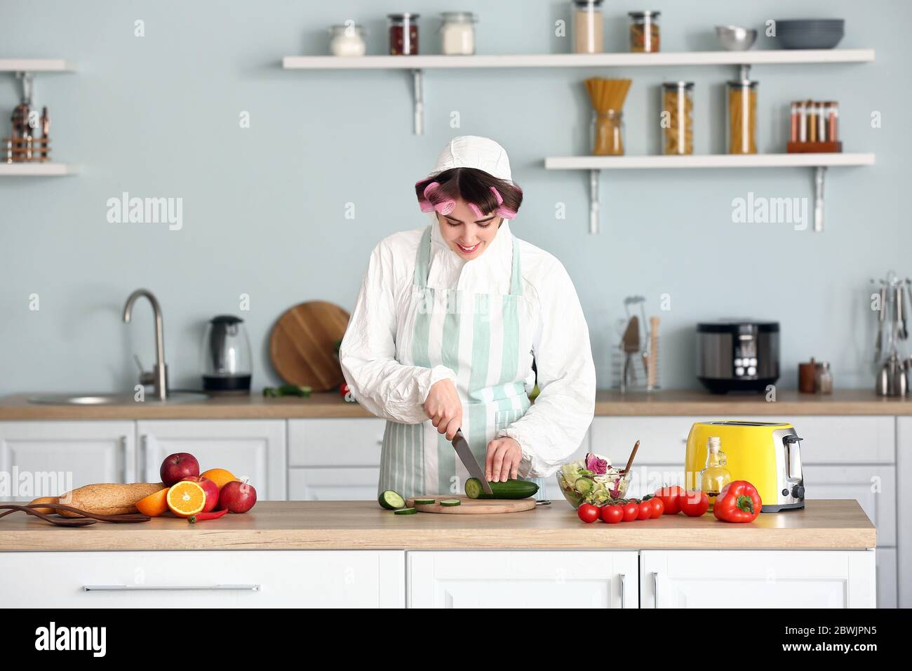 Woman kitchen cooking crazy hi-res stock photography and images - Alamy