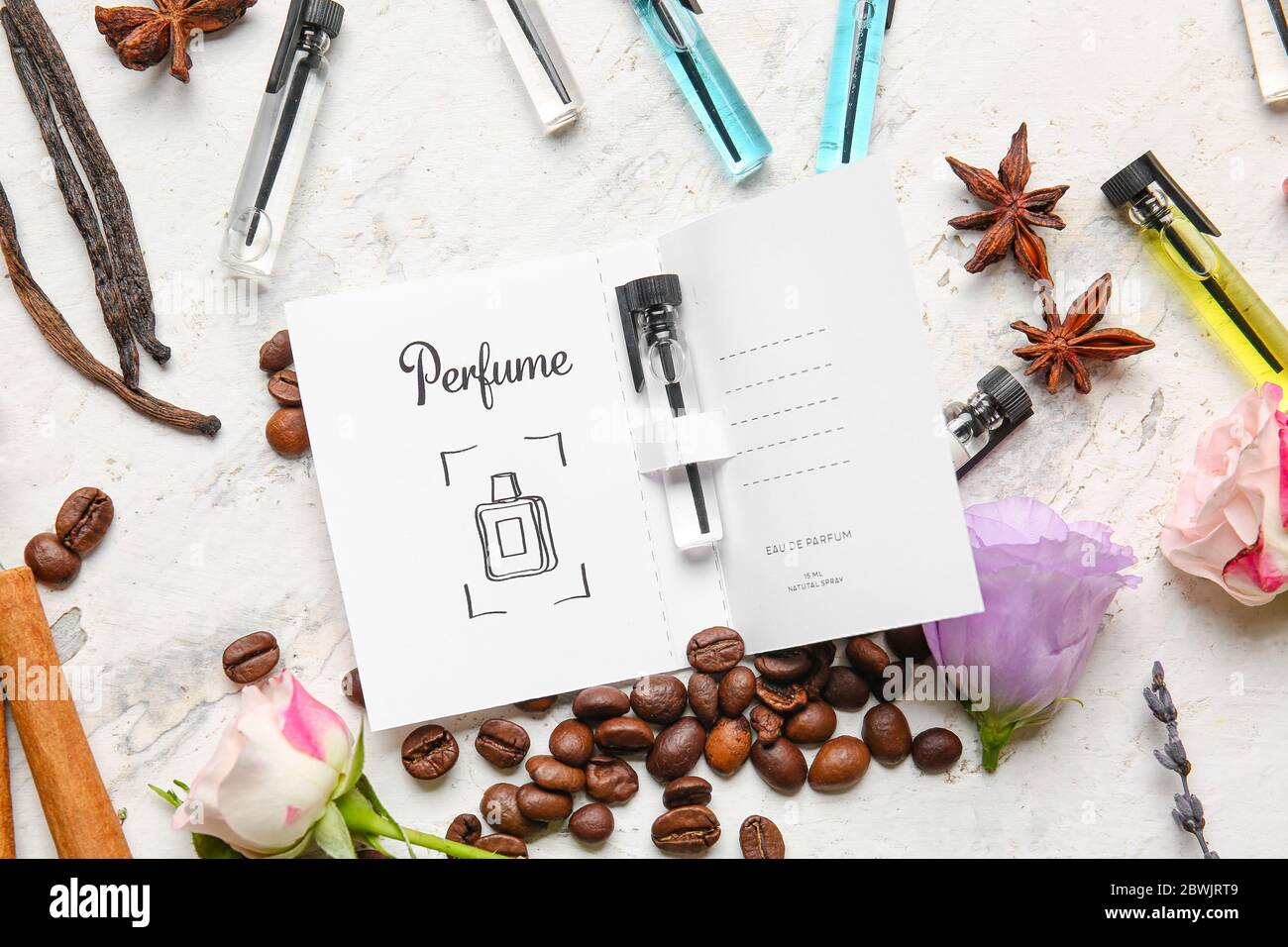 Perfume samples on light background Stock Photo - Alamy