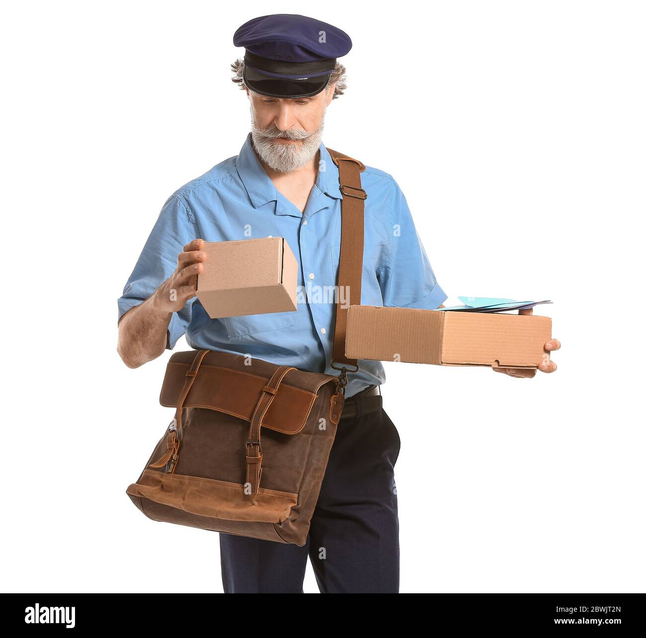 Handsome old postman on white background Stock Photo - Alamy