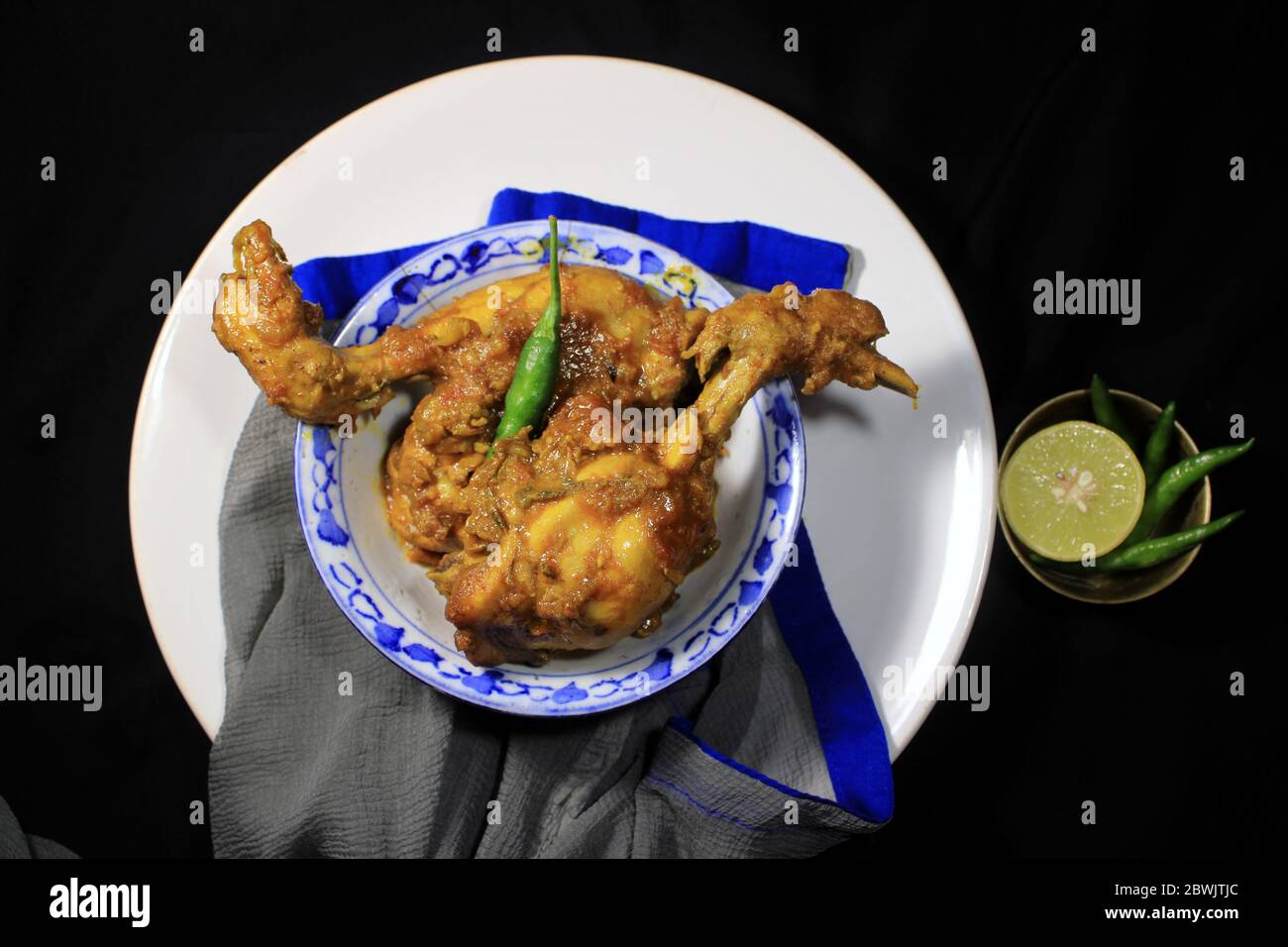 Boiled chicken Curry into white pot. Hot and spicy Chicken Curry with ...