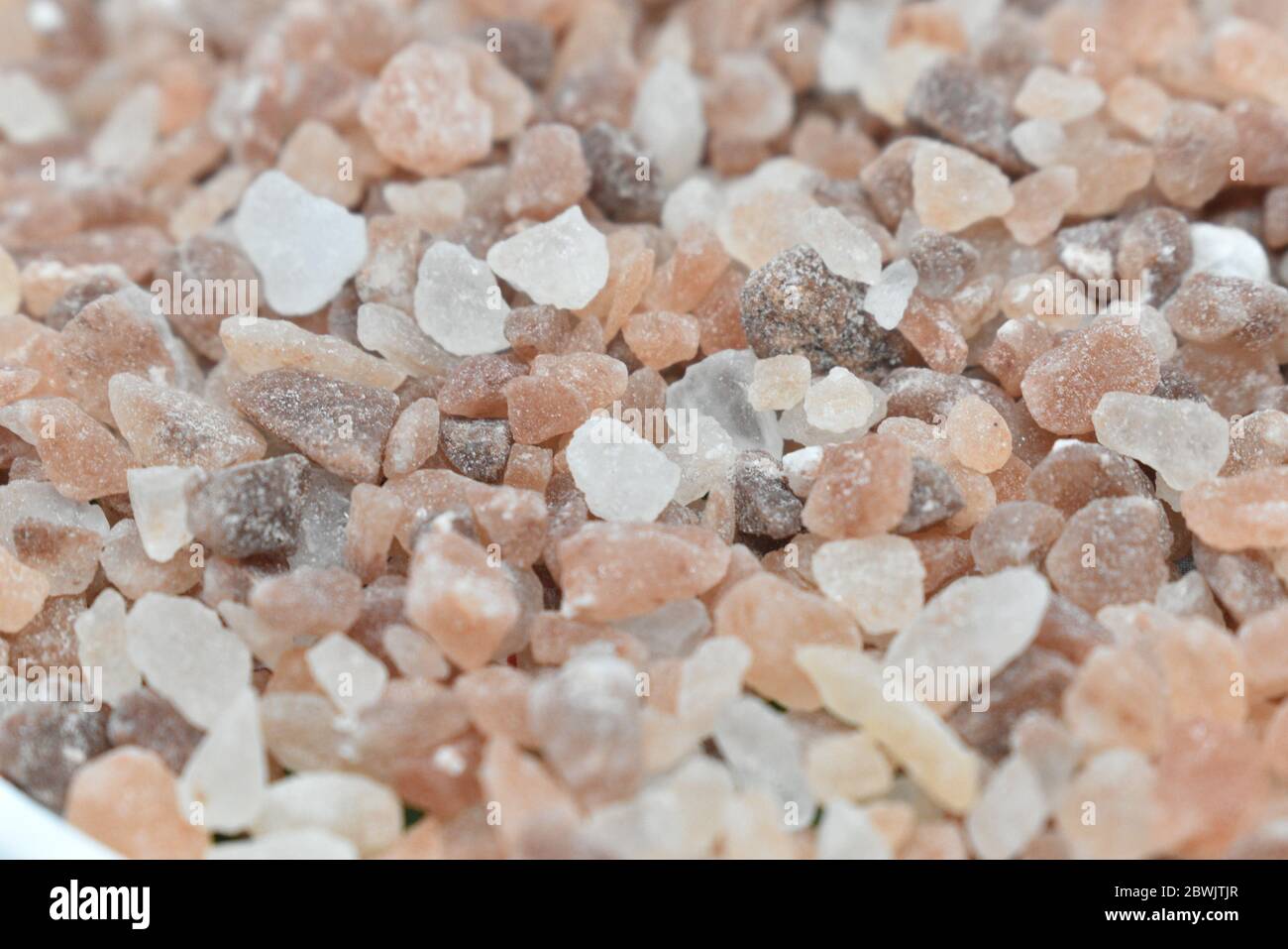 heap of salt isolated on background with clipping path Stock Photo - Alamy