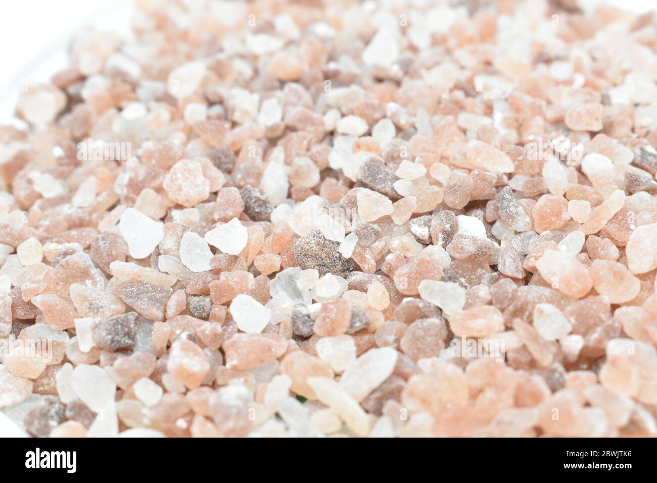 heap of salt isolated on background with clipping path Stock Photo - Alamy
