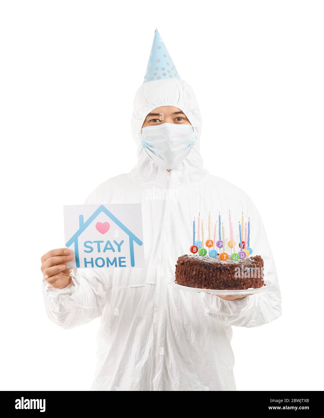 Asian man in biohazard suit and with Birthday cake on white background ...