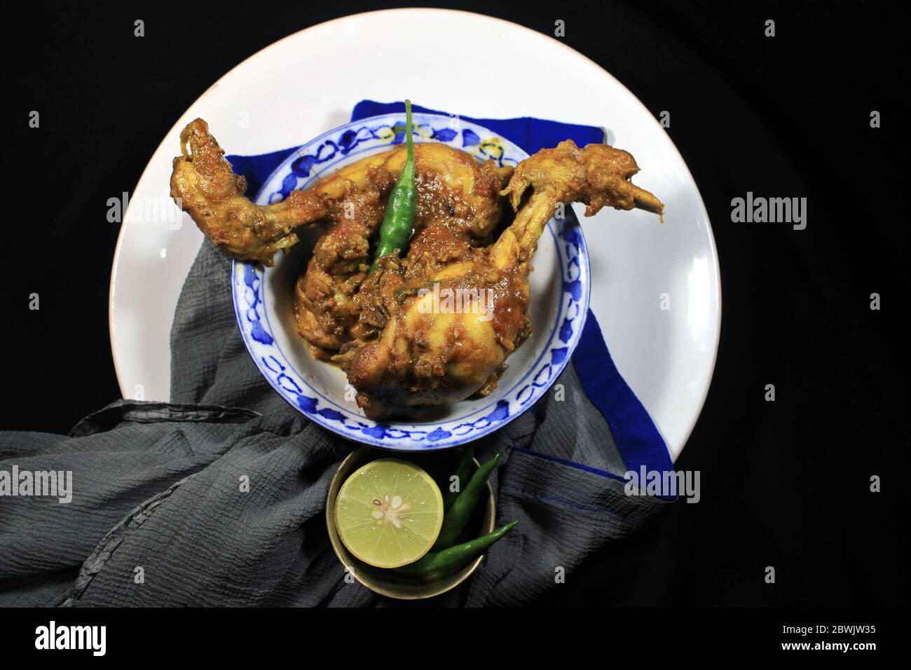 Boiled chicken Curry into white pot. Hot and spicy Chicken Curry with ...