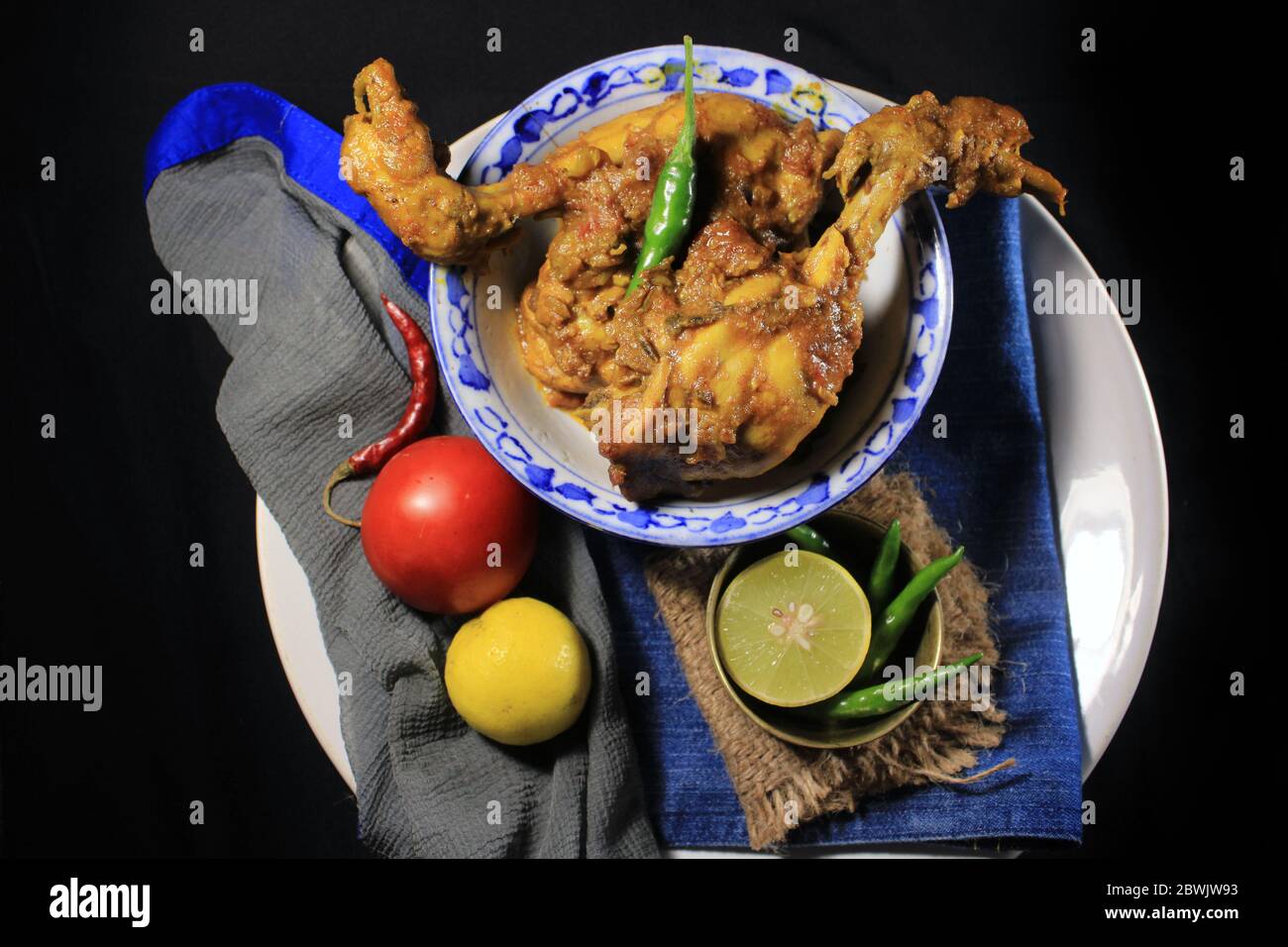 Boiled chicken Curry into white pot. Hot and spicy Chicken Curry with ...