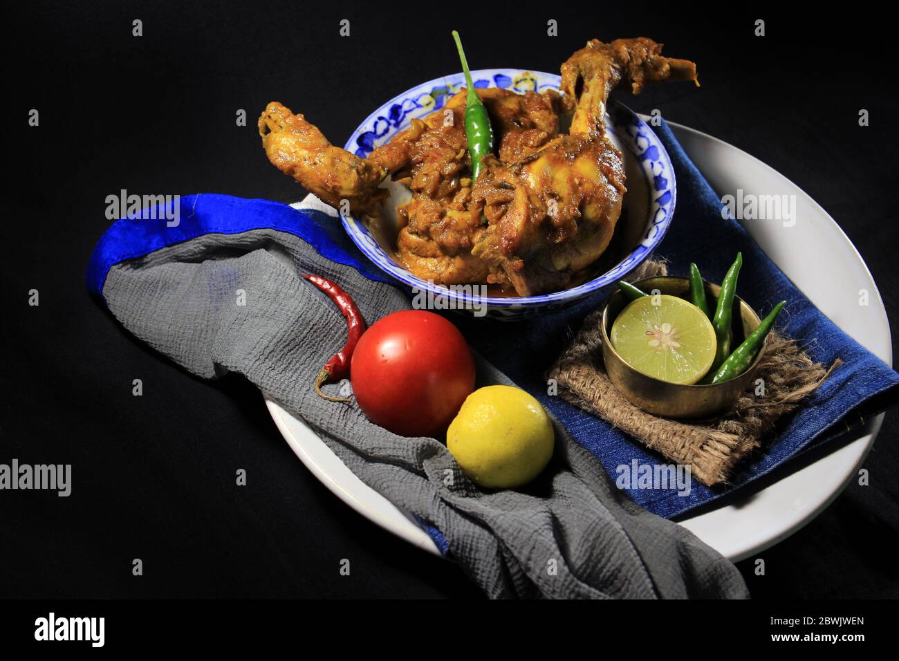 Boiled chicken Curry into white pot. Hot and spicy Chicken Curry with ...