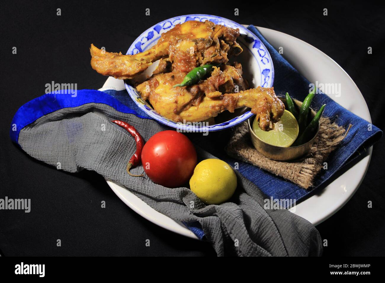 Boiled chicken Curry into white pot. Hot and spicy Chicken Curry with ...