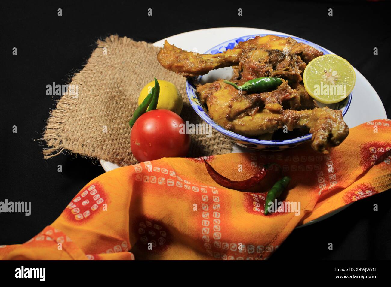Boiled chicken Curry into white pot. Hot and spicy Chicken Curry with ...