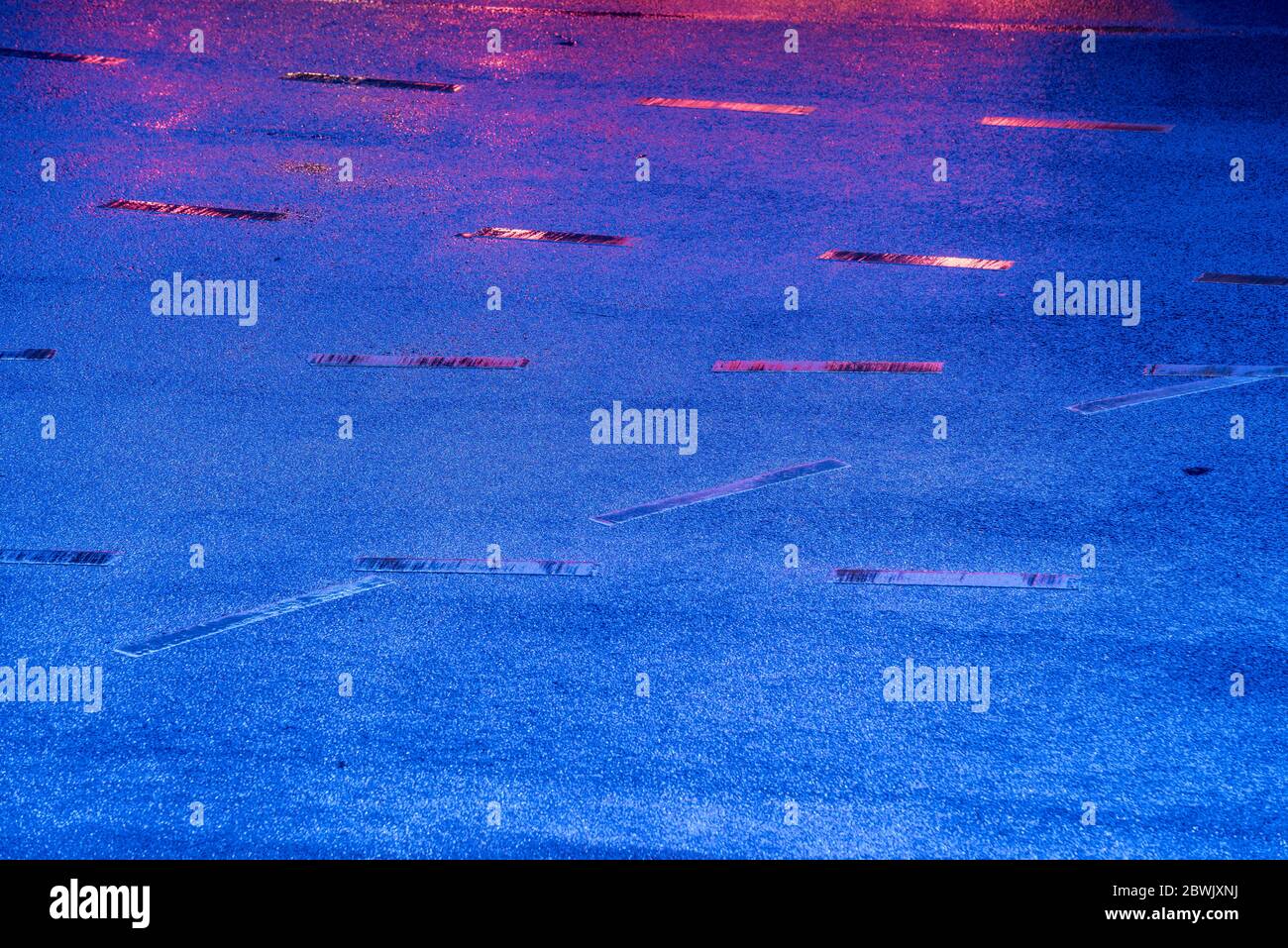 light reflection on wet asphalt road Stock Photo - Alamy