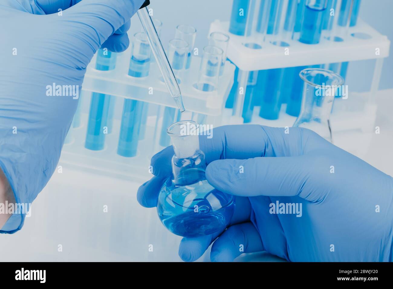 Laboratory glassware with test tubes. scientific laboratory equipment ...