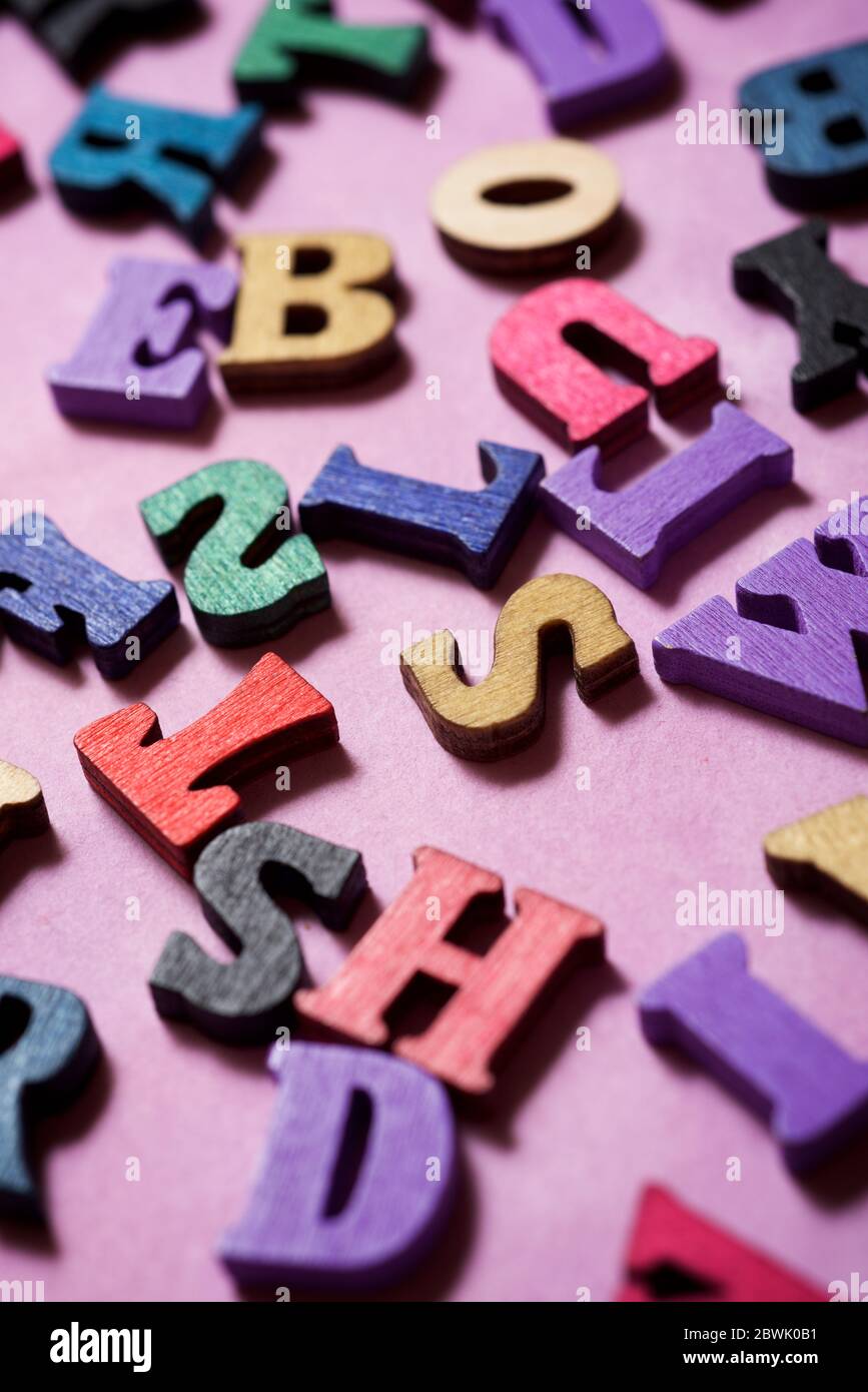 Wood letters on a table Stock Photo - Alamy