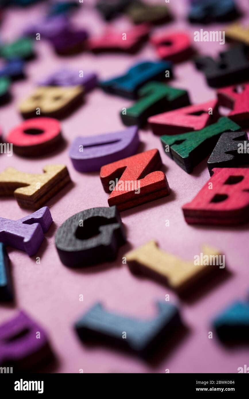 Wood letters on a table Stock Photo - Alamy