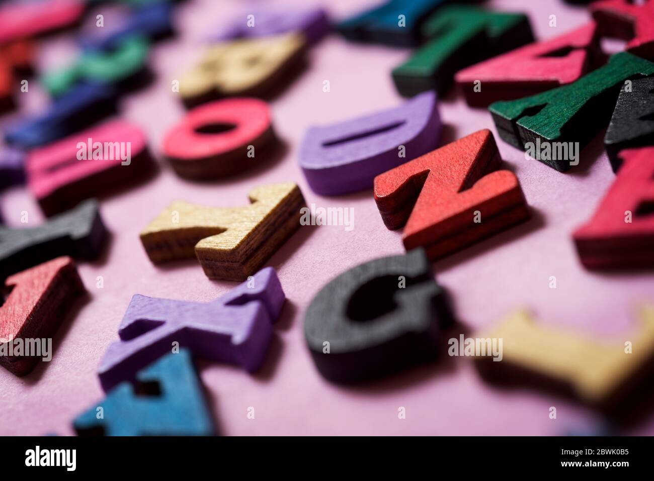 Wood letters on a table Stock Photo - Alamy