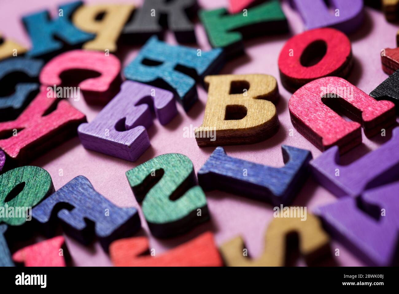 Wood letters on a table Stock Photo - Alamy
