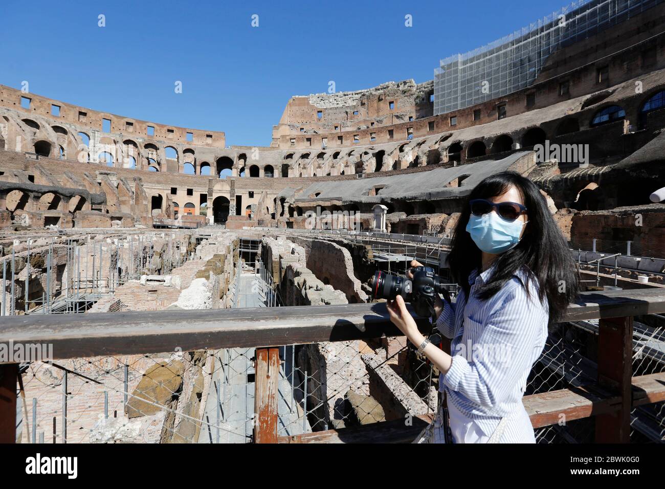 Rome, Italy. 01st June, 2020. A reporter wearing a protective mask ...