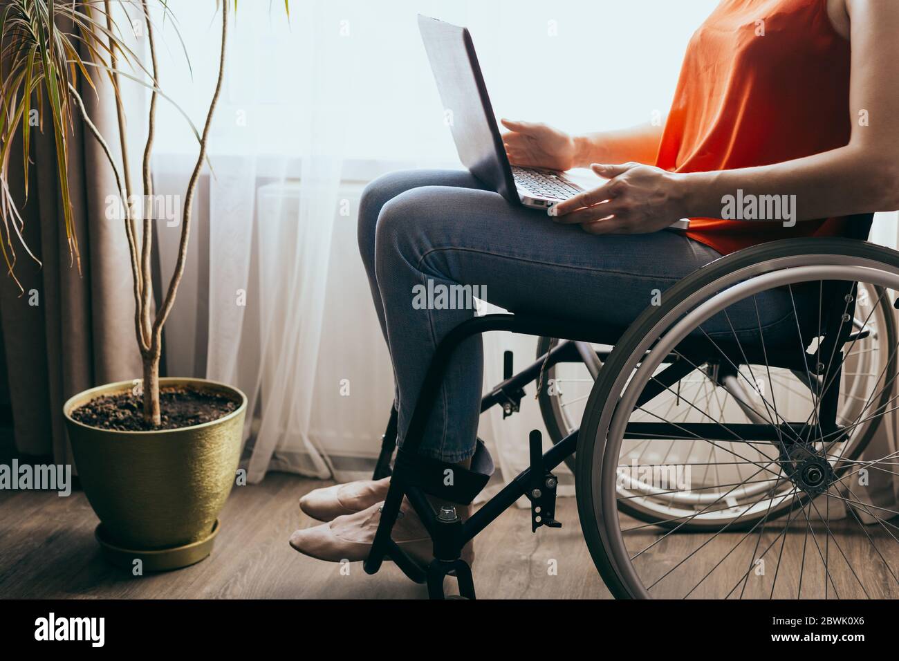 Laptop on her lap hi-res stock photography and images - Alamy