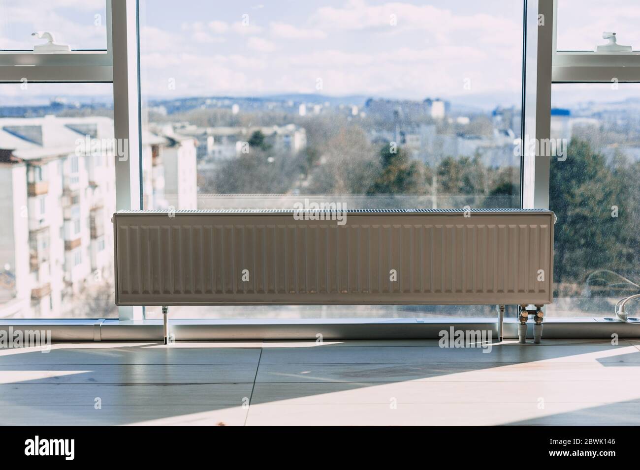 modern white radiator battery in the office near the window Stock Photo ...