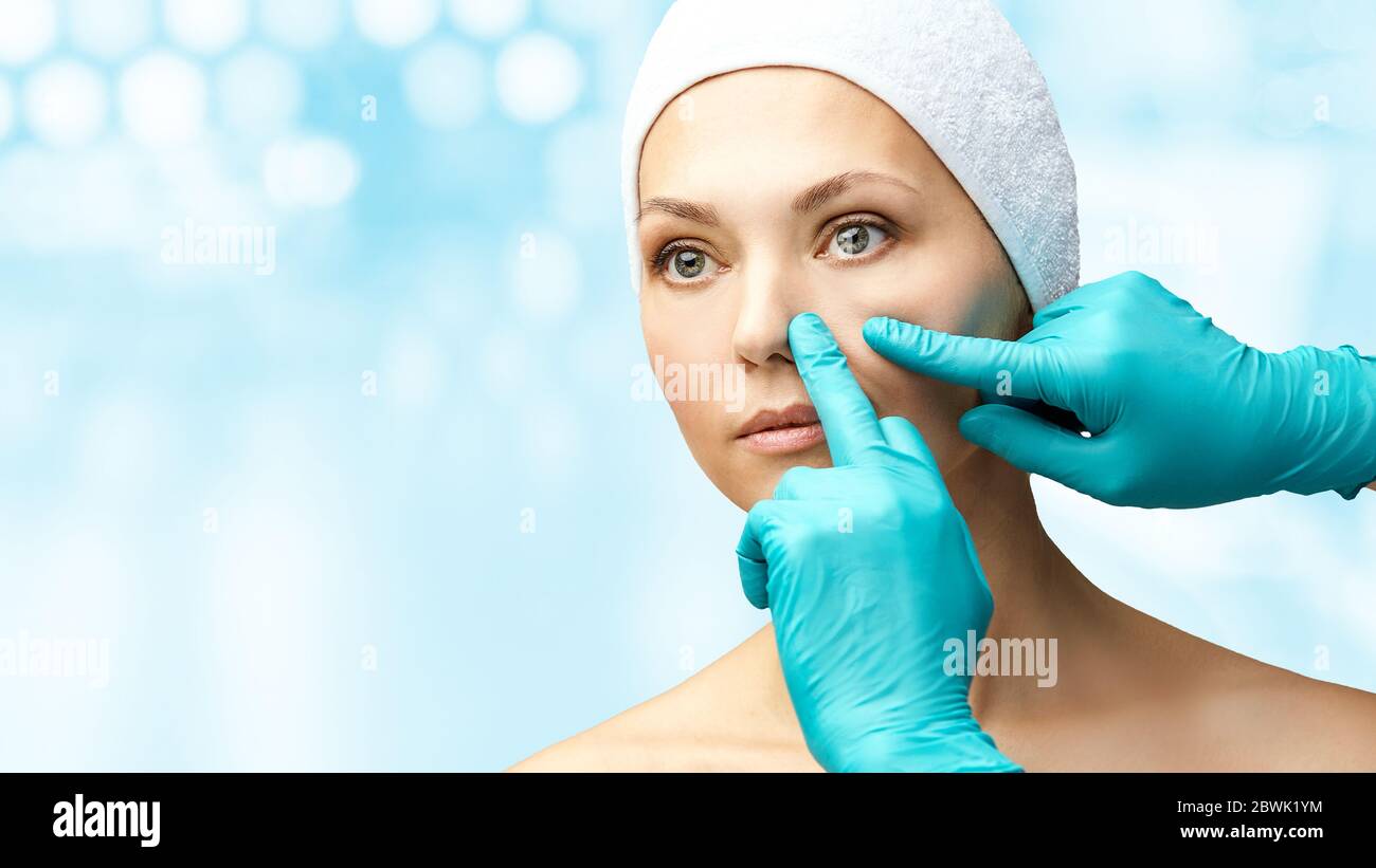 Female derma rejuvenate treatment. Doctor in gloves touch woman face ...