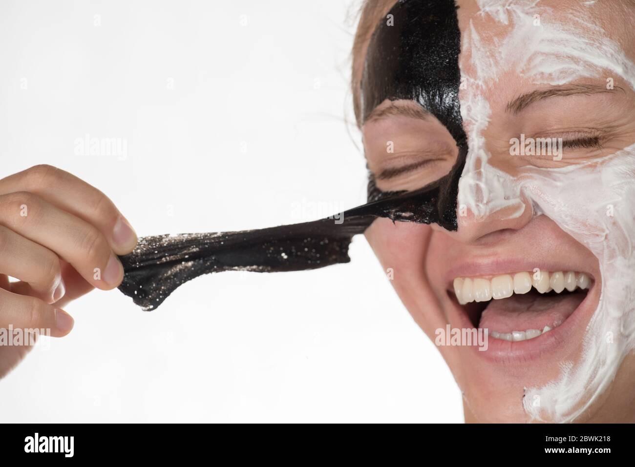 Happy beautiful girl with acne smiling on a white background in a ...
