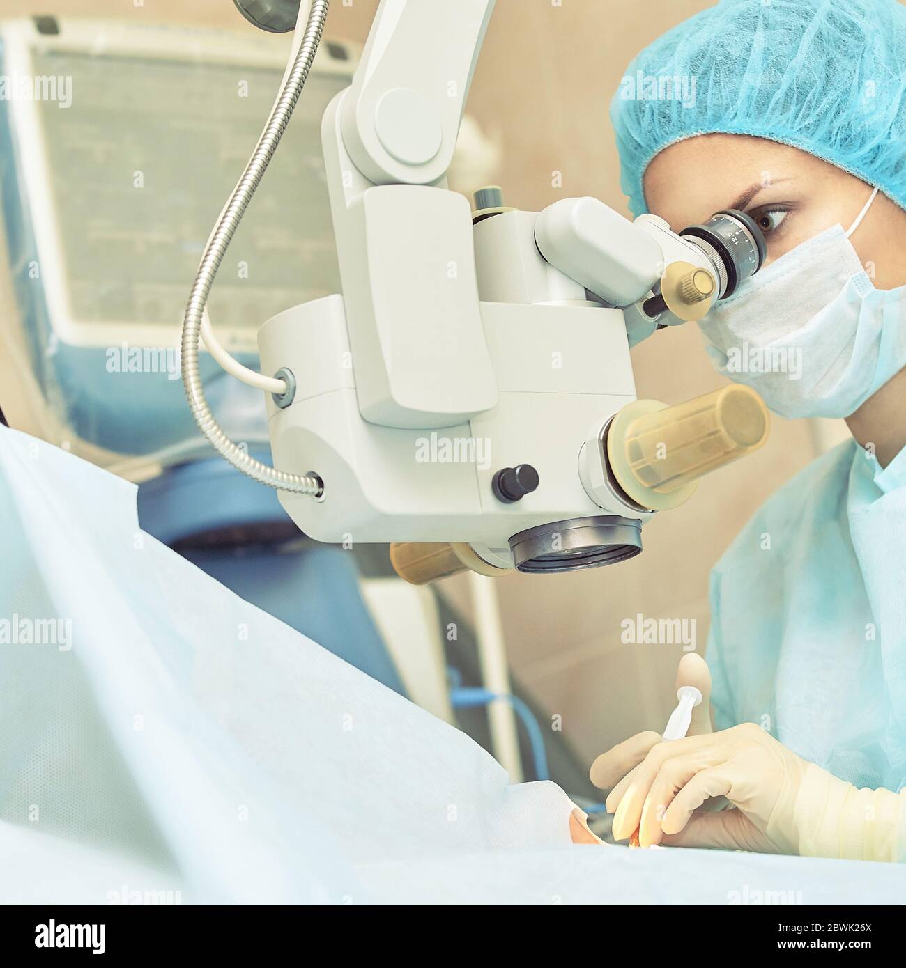 Ophthalmology laser microscope operation. Doctor in clinic. Patient eye ...