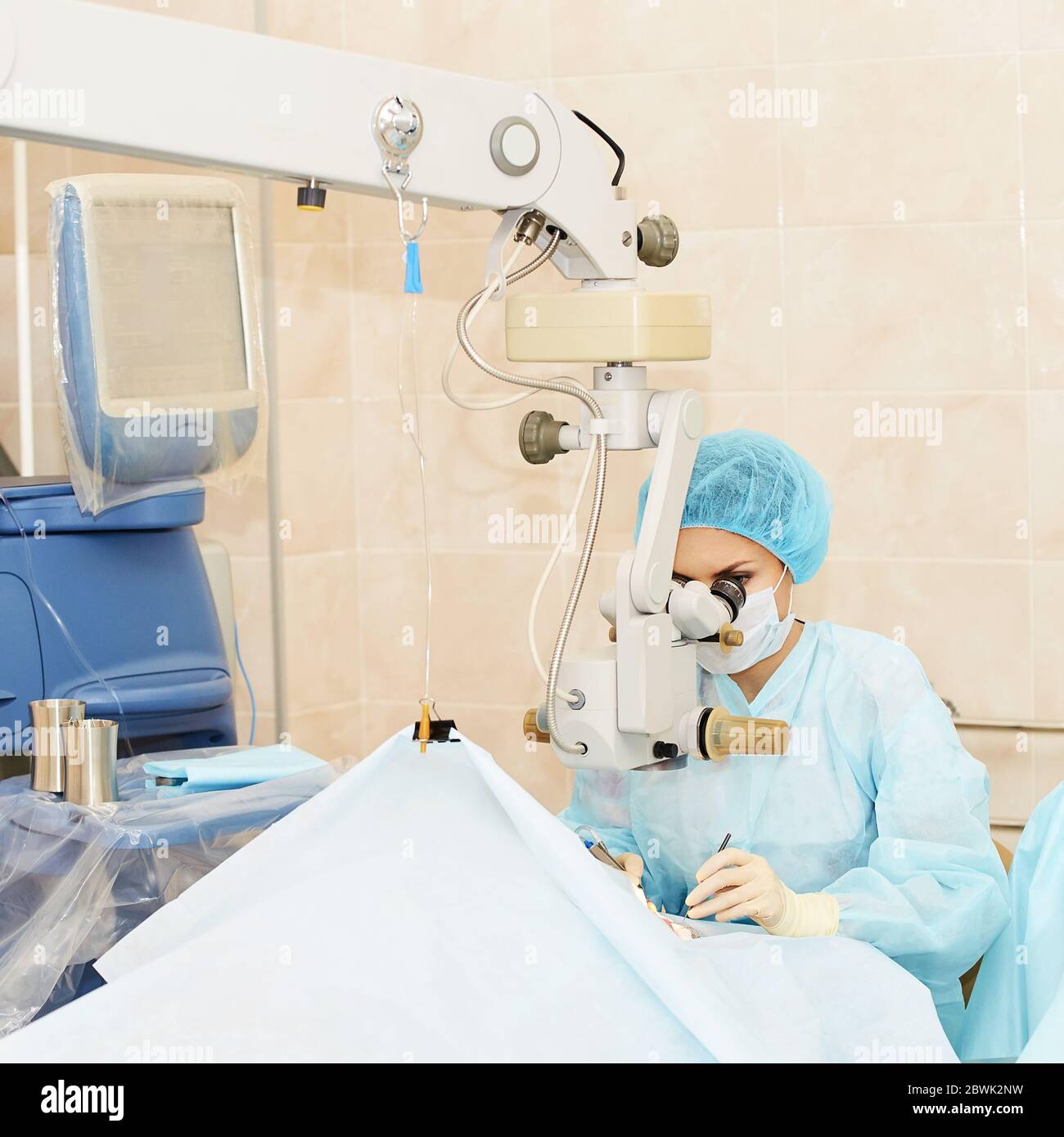 Ophthalmology laser microscope operation. Doctor in clinic. Patient eye ...