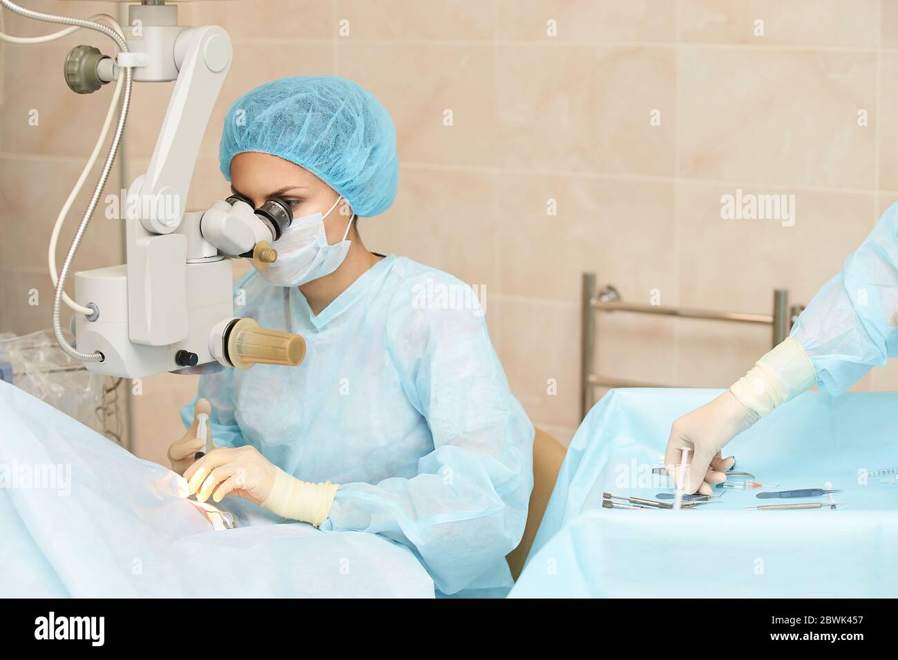 Ophthalmology laser microscope operation. Doctor in clinic. Patient eye ...
