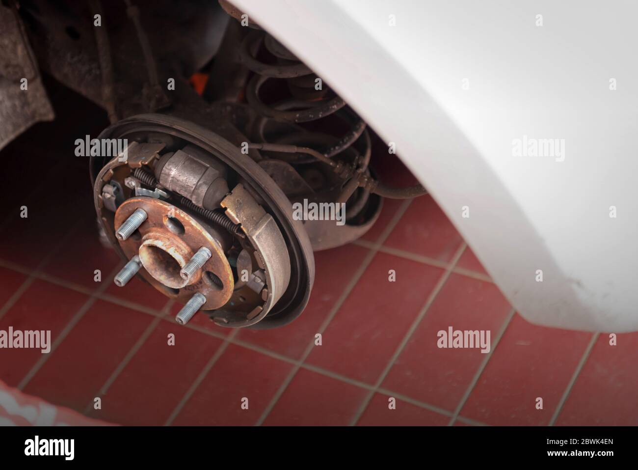 Close up view of car wheel brake shoes on the garage Stock Photo - Alamy