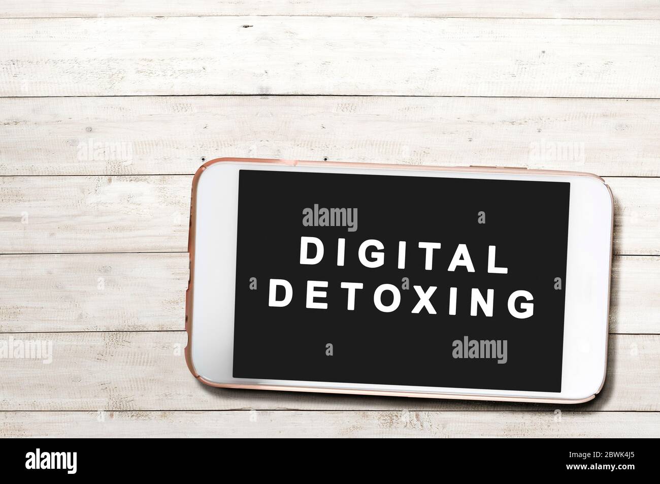 Smartphone with Digital Detoxing text on the screen. Digital Detox ...