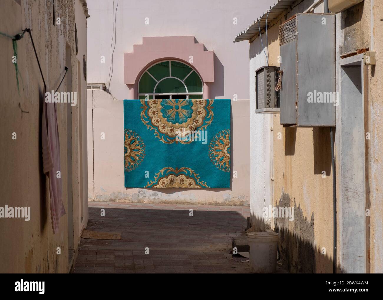 Carpet on a wall drying in the sun, Muscat, Sultanate of Oman Stock ...