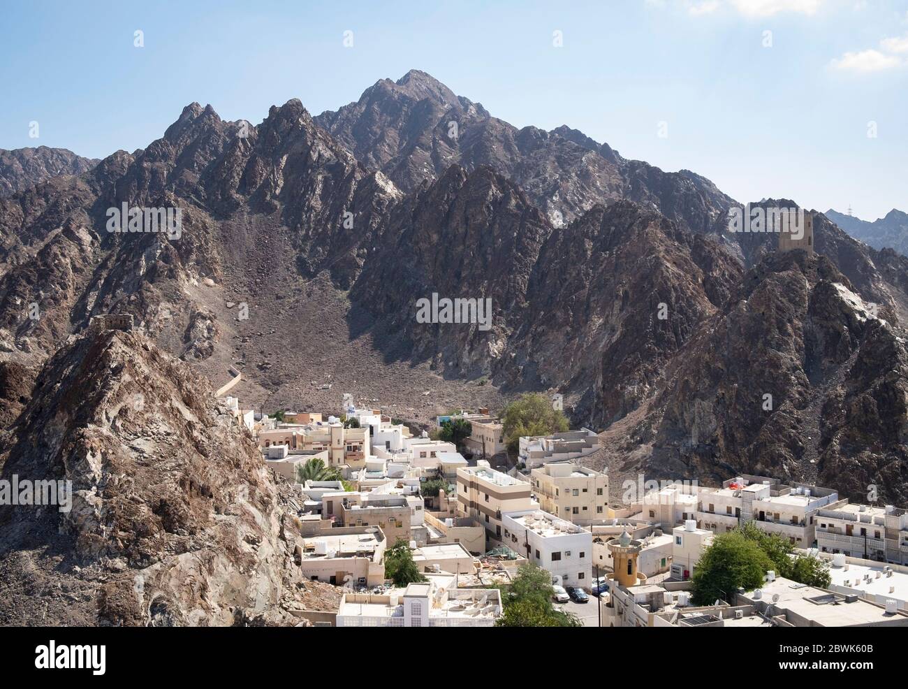 Elevated view of the Mutrah area surrounded by mountains, Muscat ...
