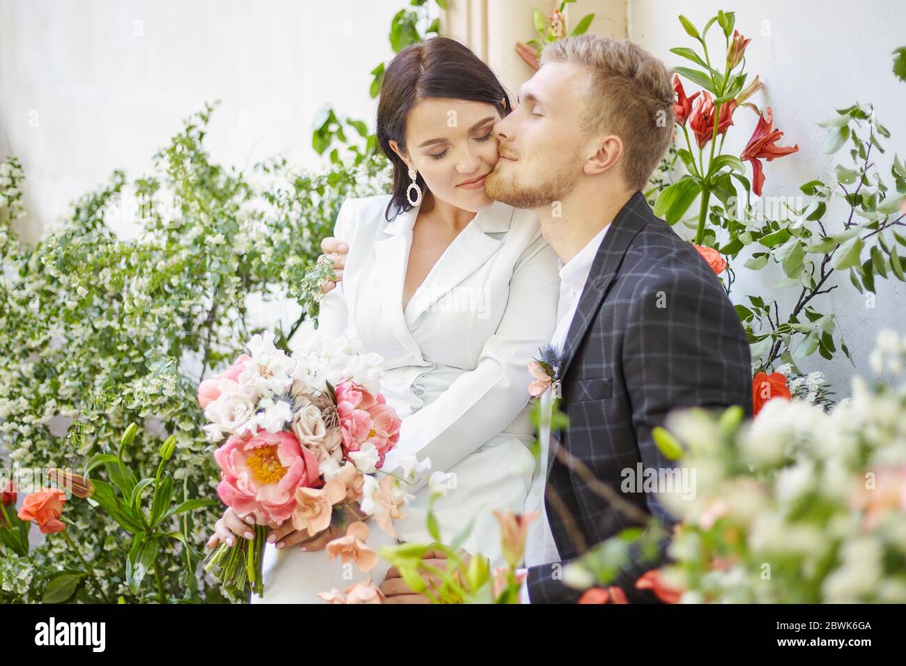 newlyweds happy together just had a ceremony Stock Photo - Alamy