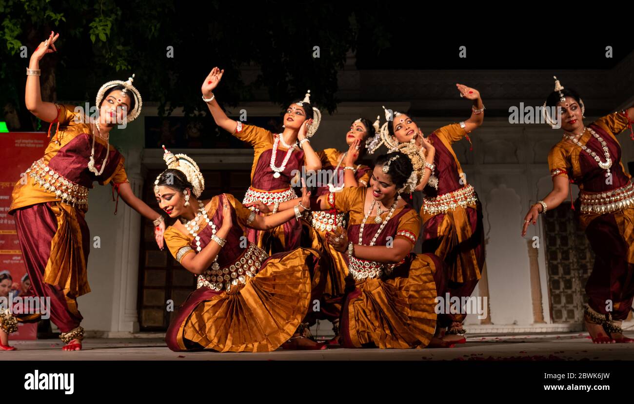Young girl performing Indian classical Odissi dance in Pushkar Camel ...