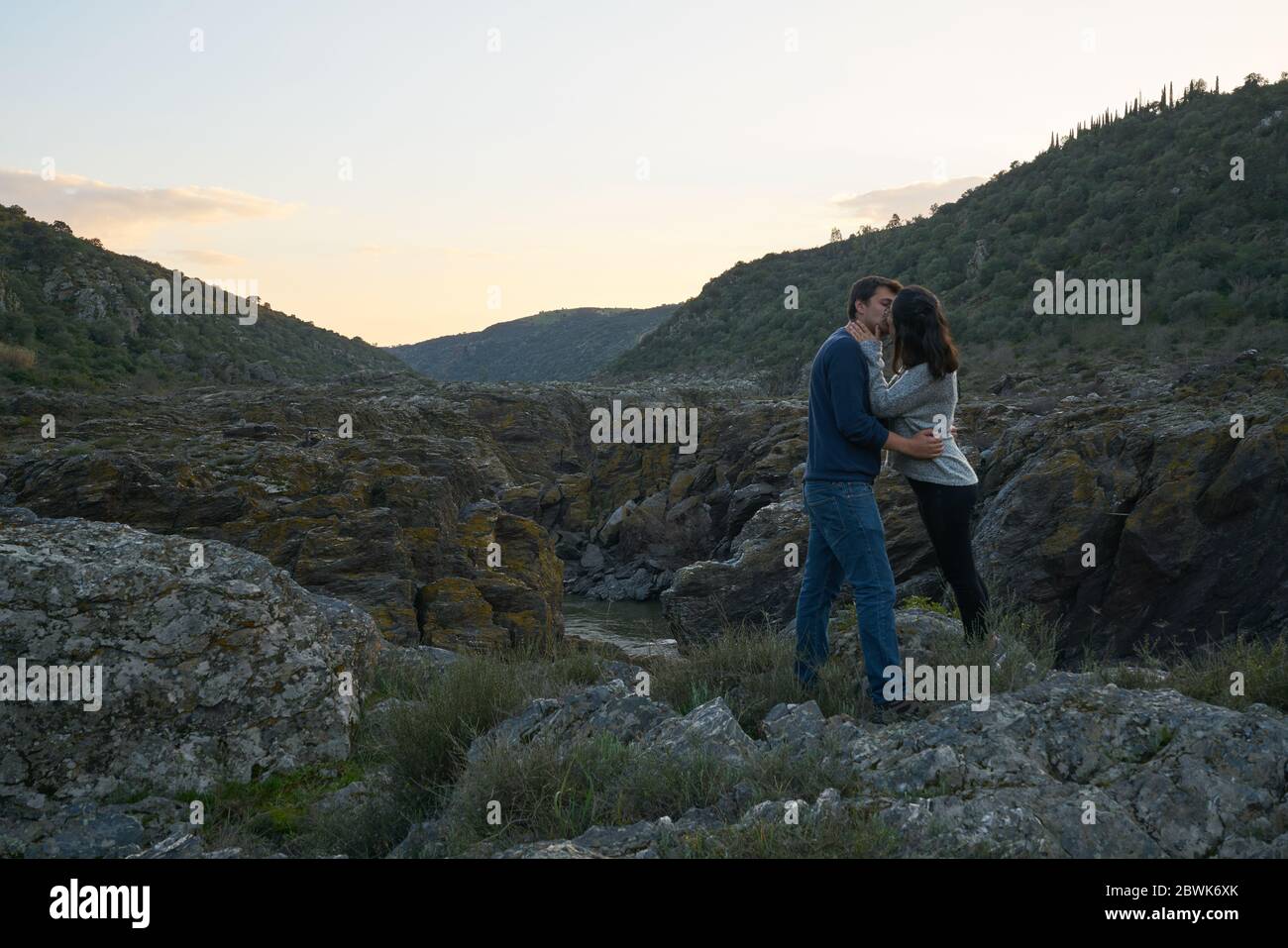 Couple kissing in waterfall hi-res stock photography and images - Alamy