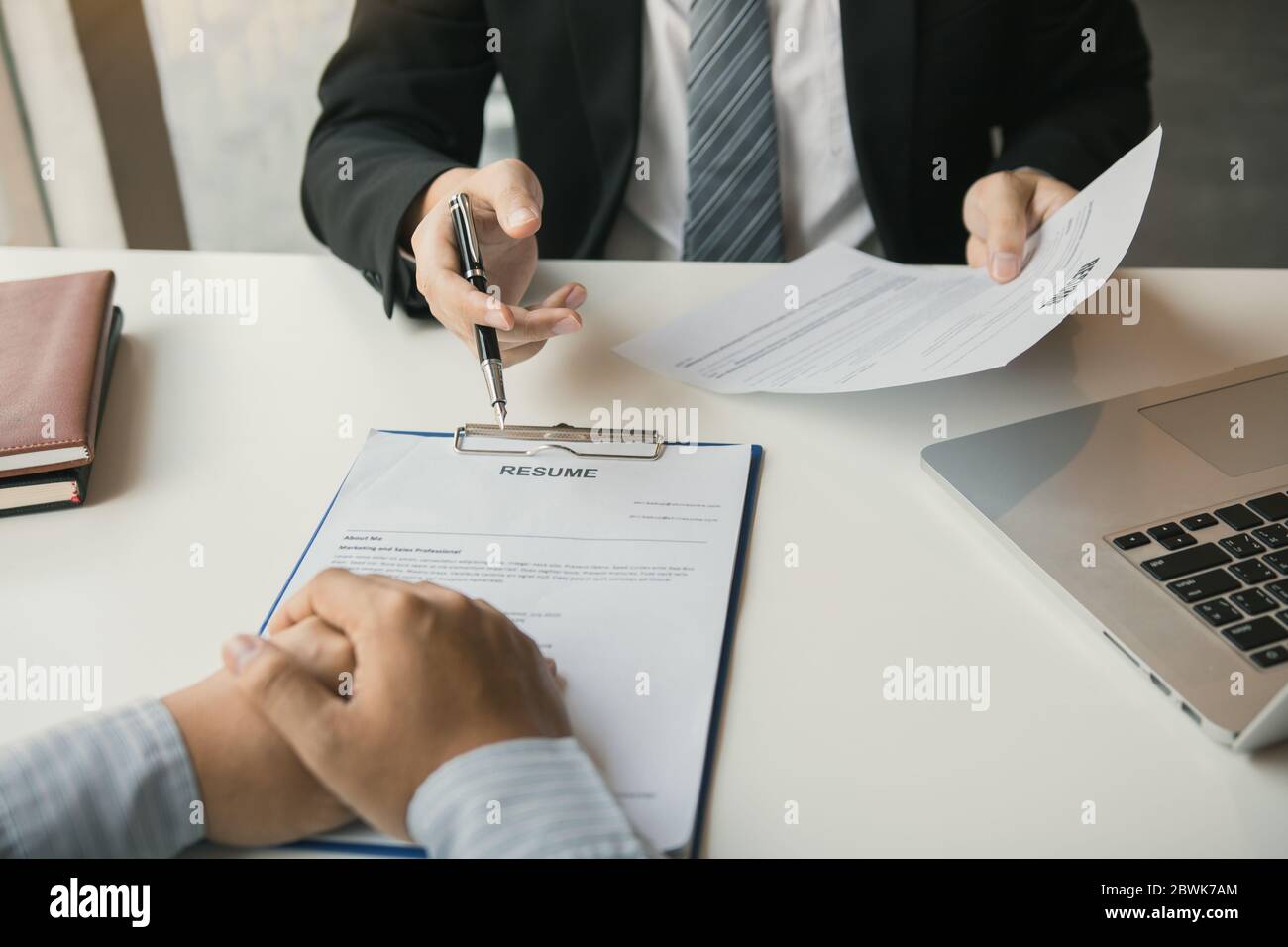 Employees are explaining about their past work experience for job ...