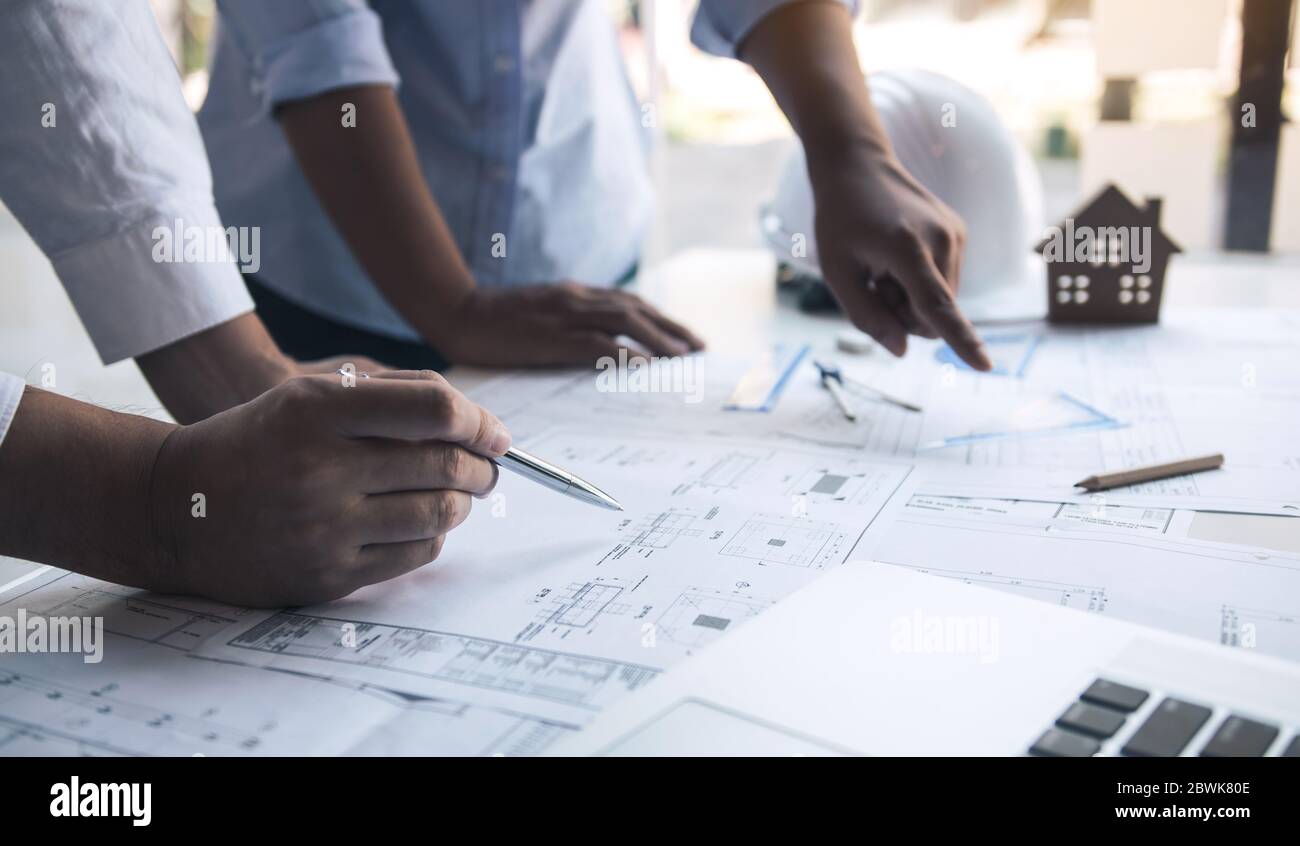 Structural engineering designers are working on the blueprints and ...