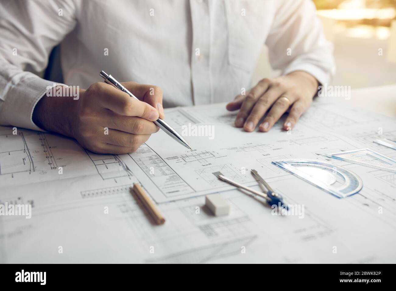 Engineers are designing working on blueprints and analyzing the ...