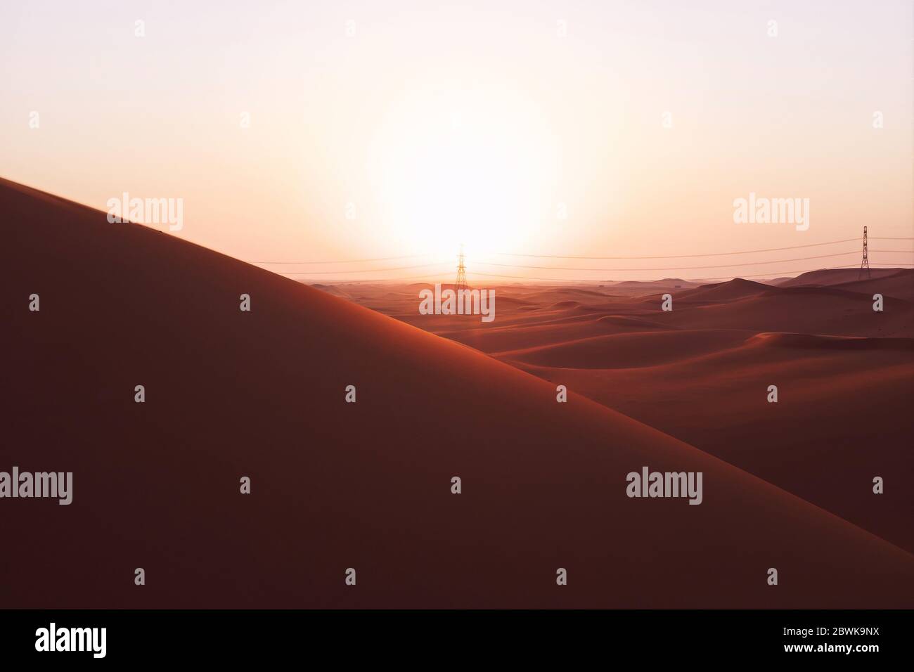 Pastel colored sunrise on the red sand dunes of the Al Dahna Desert in ...