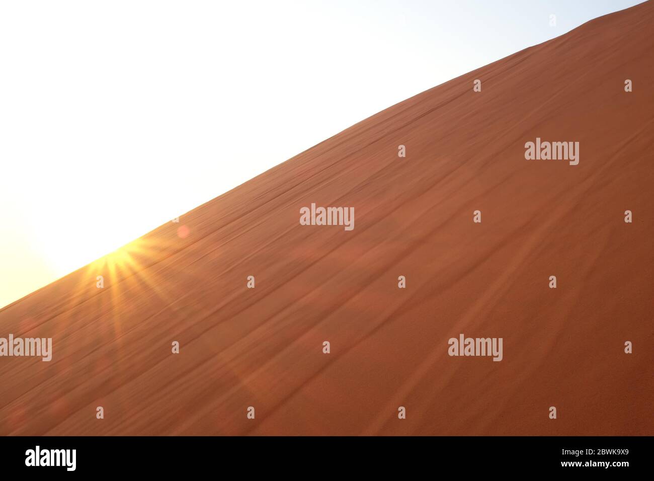 Bright sunrise on the red sand dunes of the Al Dahna Desert in Riyadh ...