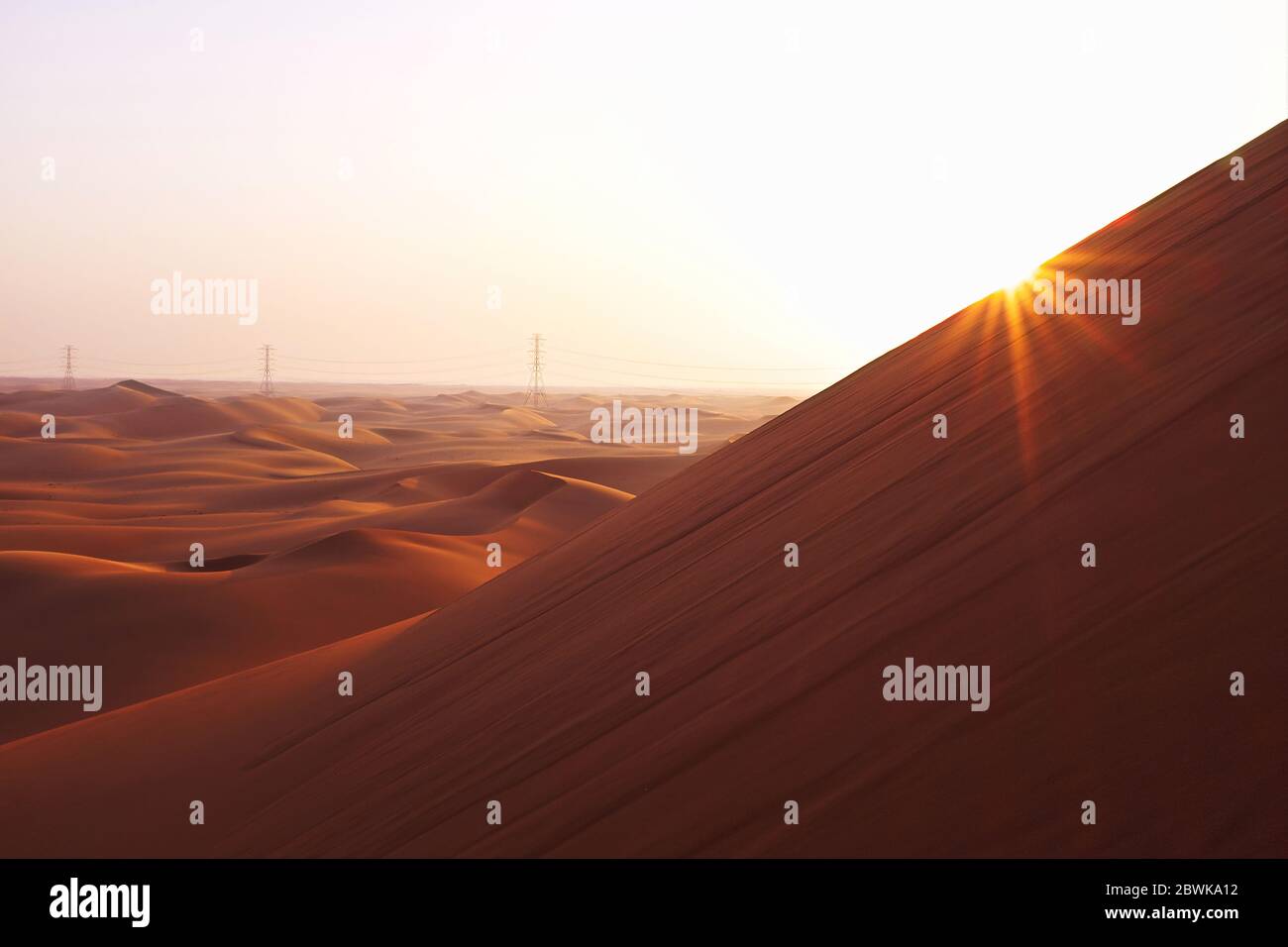 Bright sunrise on the red sand dunes of the Al Dahna Desert in Riyadh ...