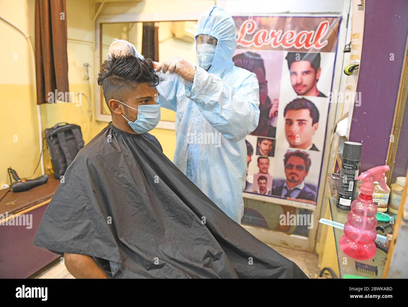 Beawar, Rajasthan, India - June 1, 2020: A barber wearing personal ...