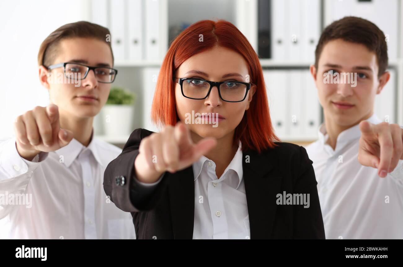 Group of serious workers that pointing at you Stock Photo - Alamy