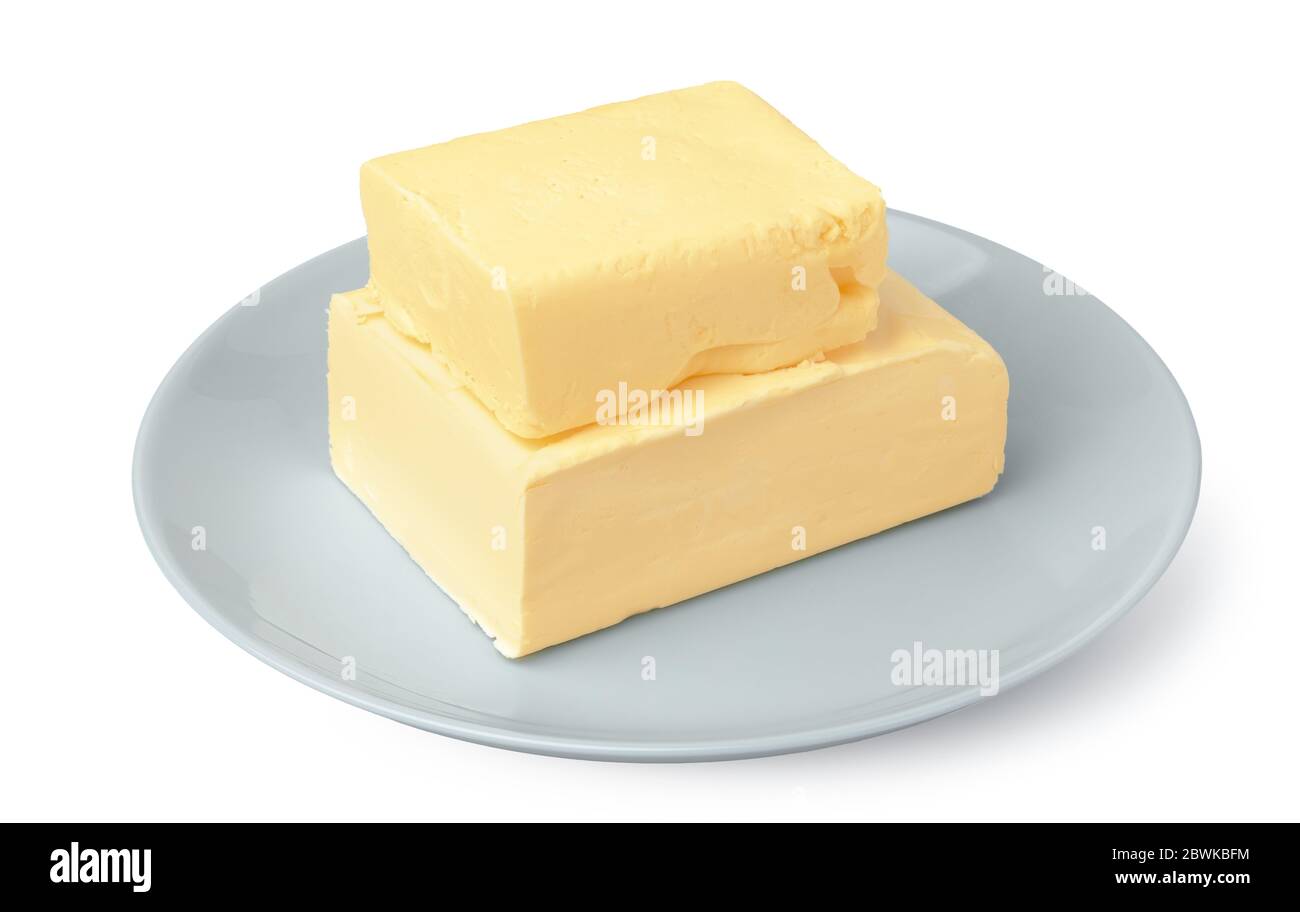 Butter on white plate isolated on white background Stock Photo - Alamy