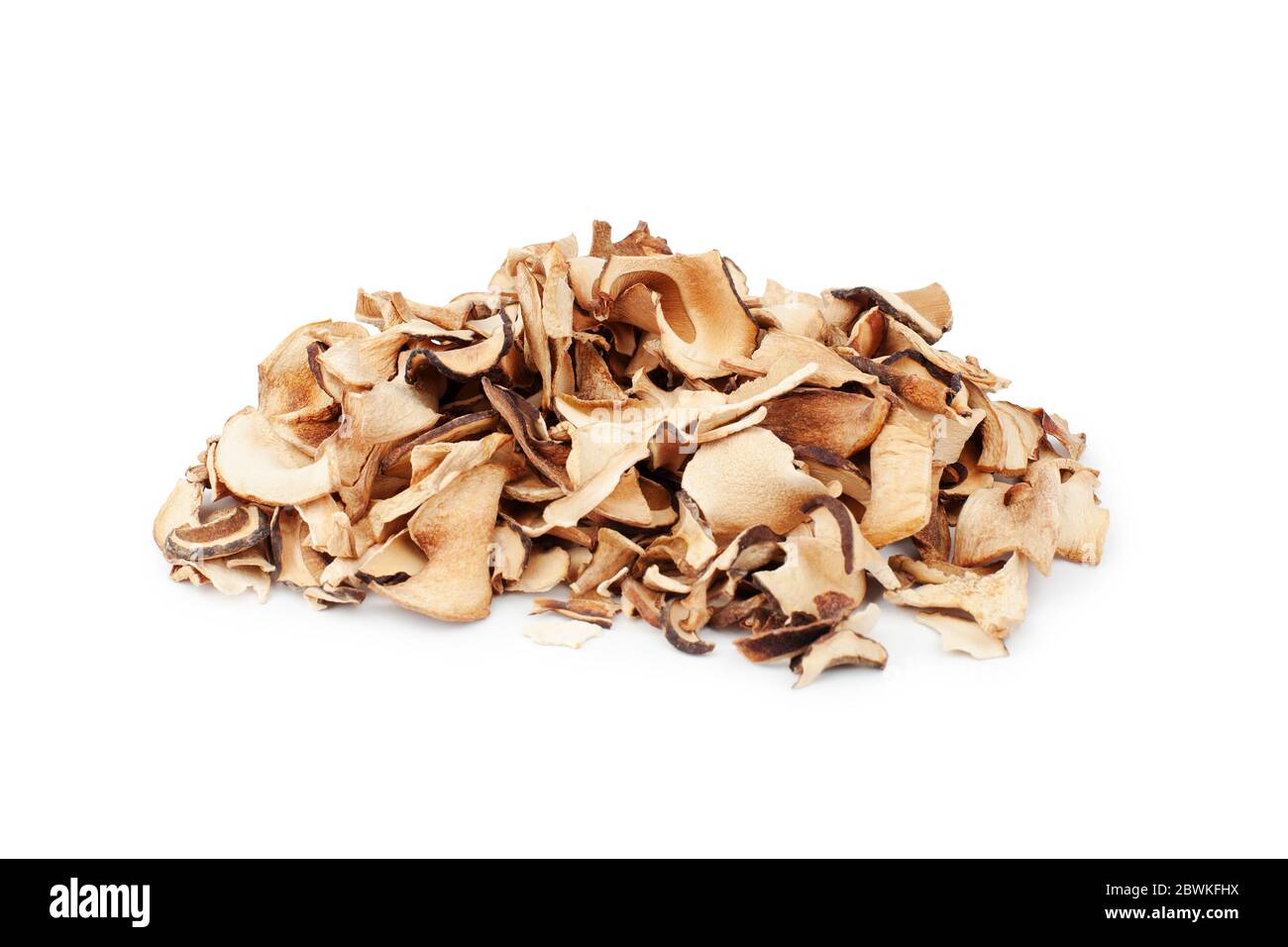Edible dried mushrooms pile on white background isolated close up, heap ...